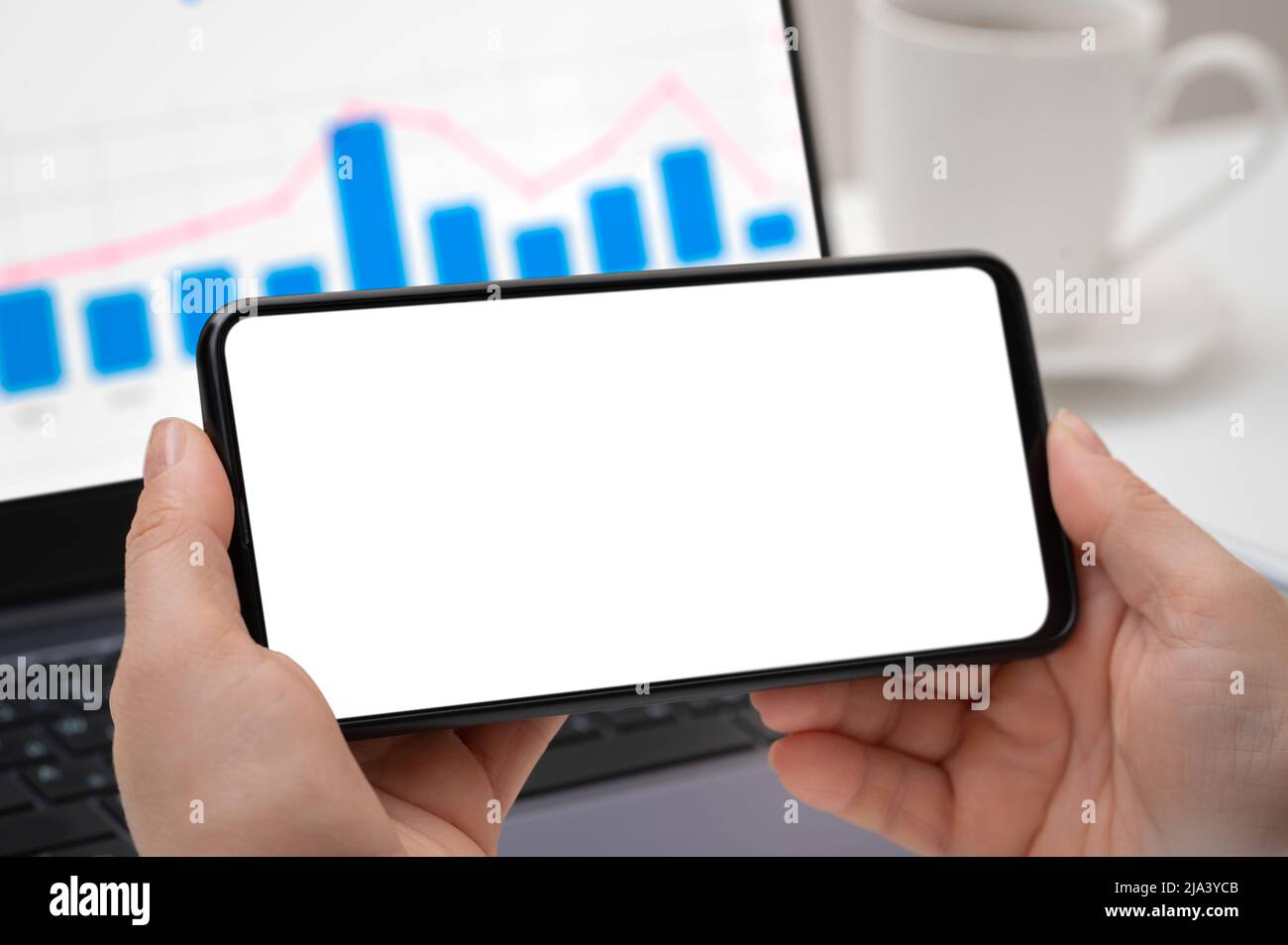 Mockup cellphone. Woman hand holding phone horizontally with blank ...