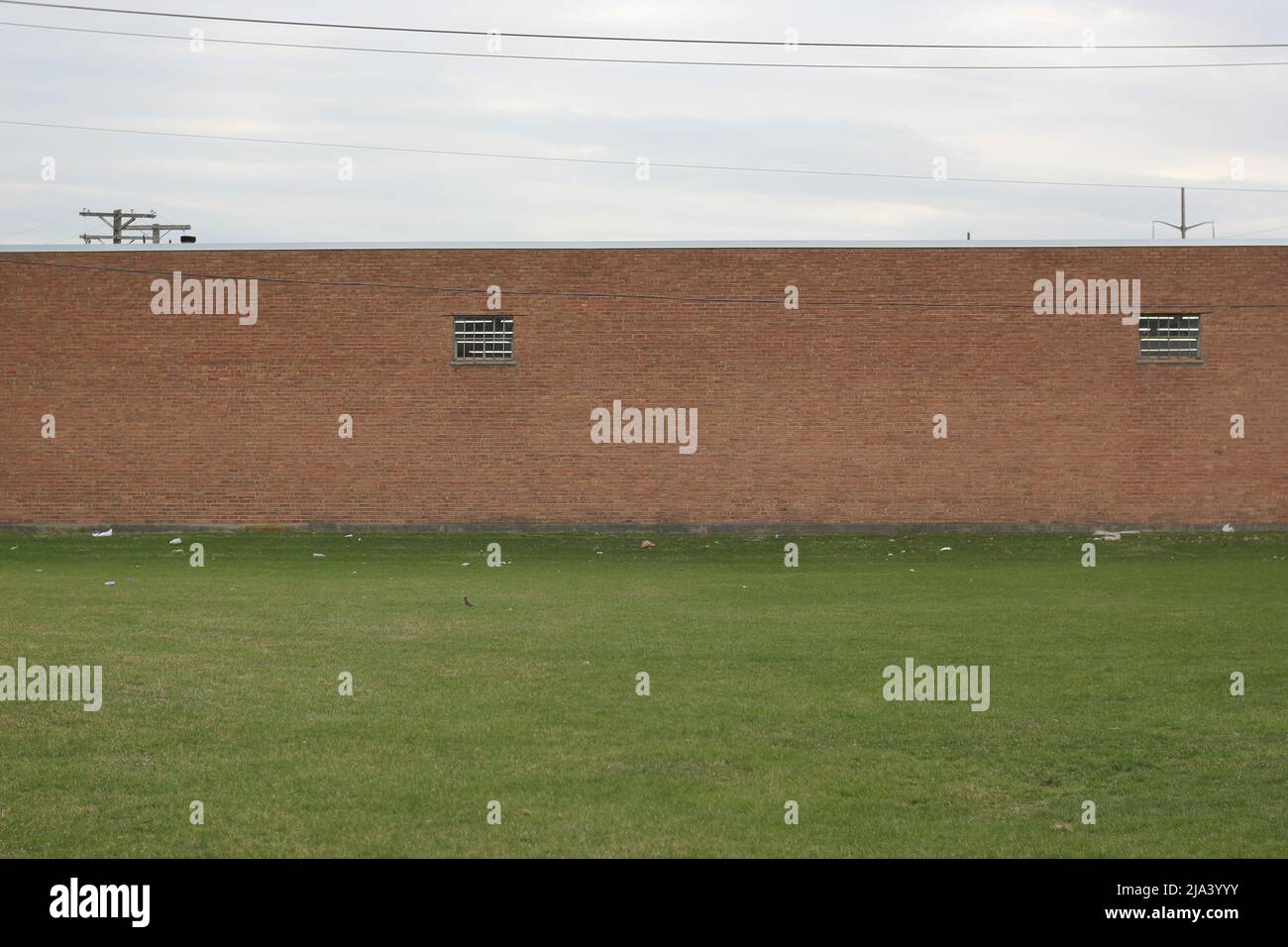 Typical brick wall of a common warehouse Stock Photo - Alamy