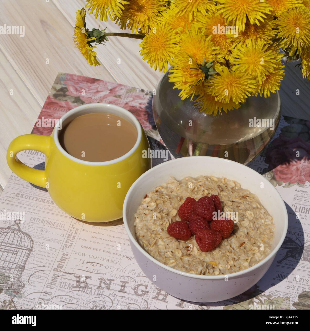 breakfast with porridge with raspberry and coffee Stock Photo - Alamy