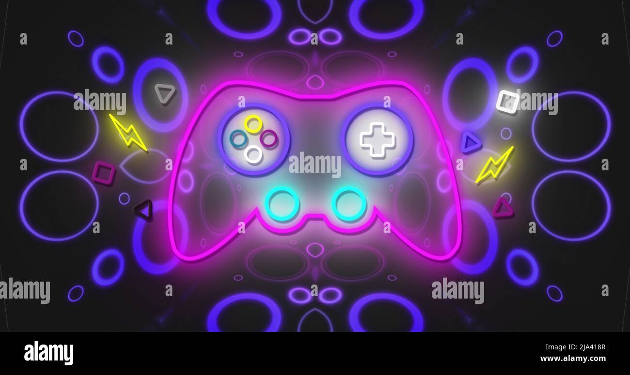Image of neon gaming pad over neon circles and shapes on black ...