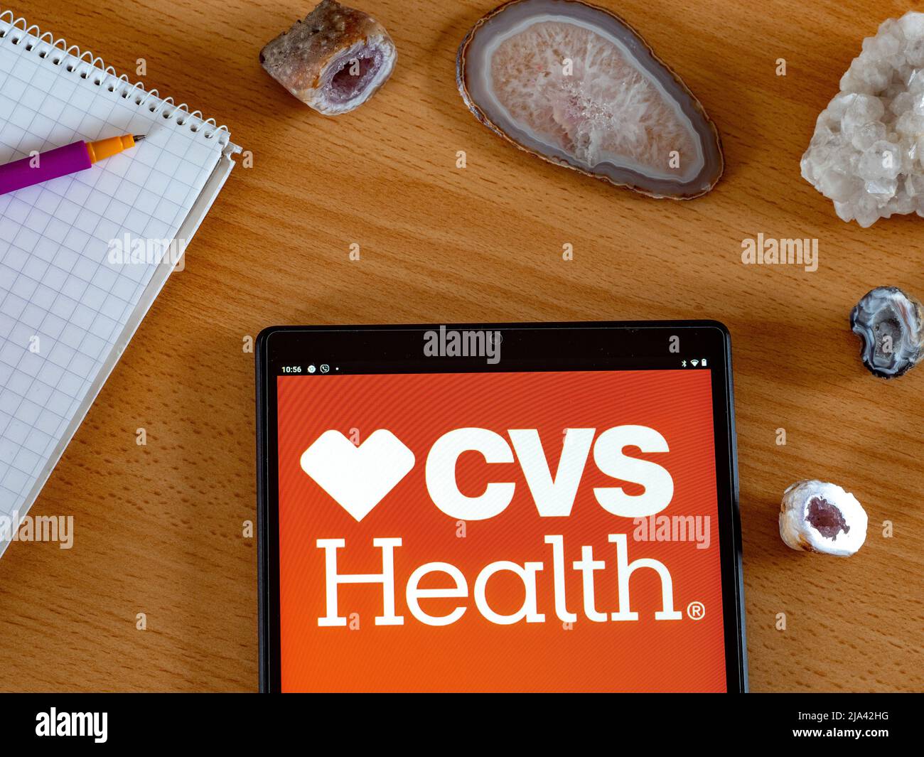 In this photo illustration, a CVS Health Corporation logo seen ...