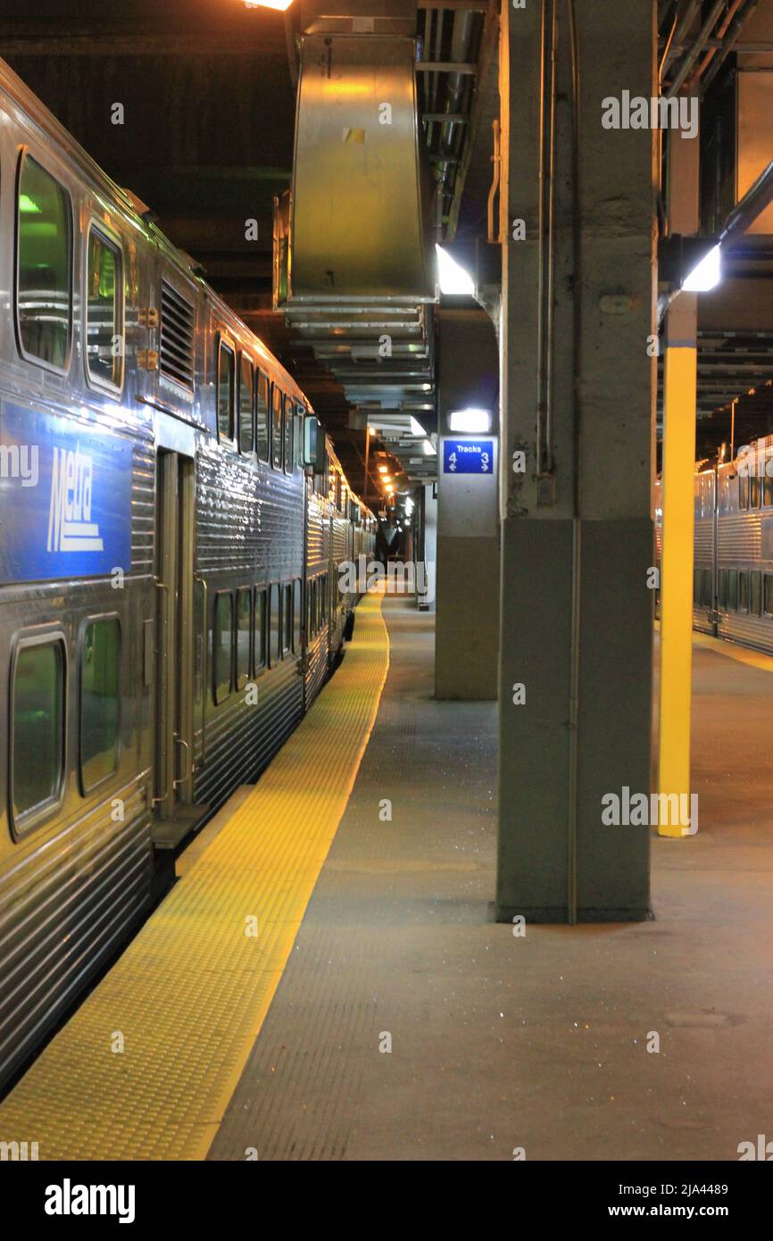 A mass transit public train waiting in the station Stock Photo - Alamy