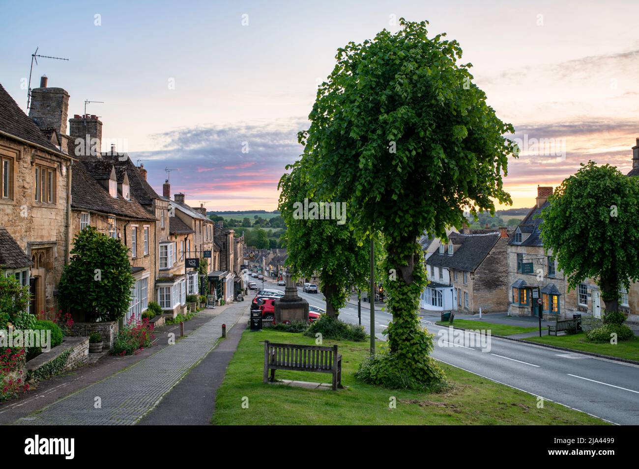 Cotswold Cottages on the hill in Burford in the spring at sunrise ...