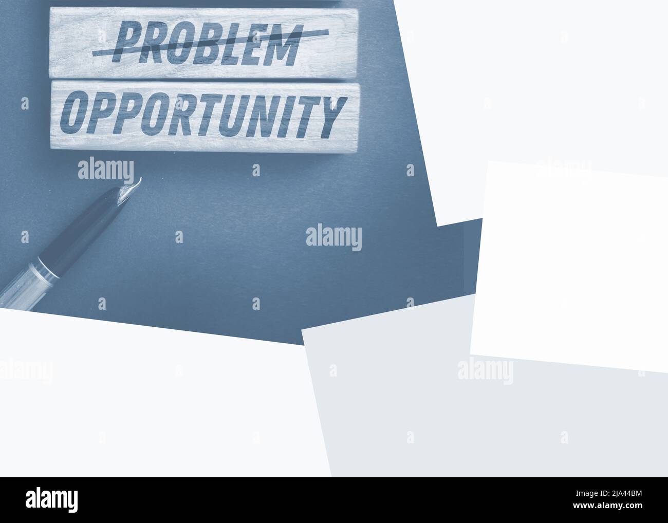 Problem crossed out and opportunity on wooden blocks. Business startup ...