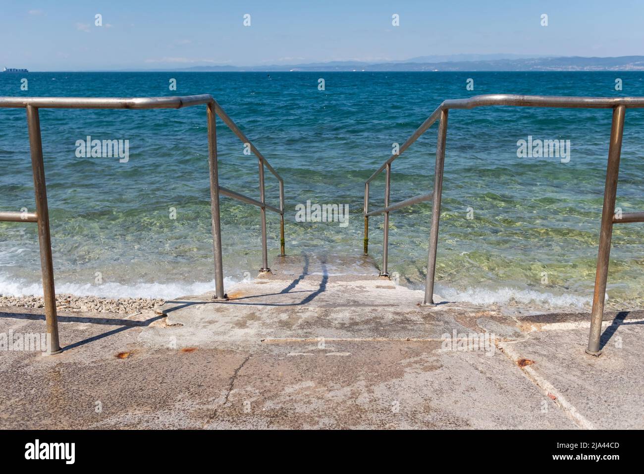 Accessible beach with ramp for people with disability using wheelchair ...