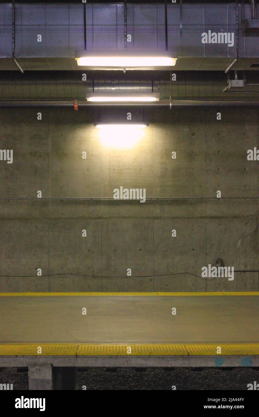 Plain authentic industrial corridor with a bright fluorescent light ...