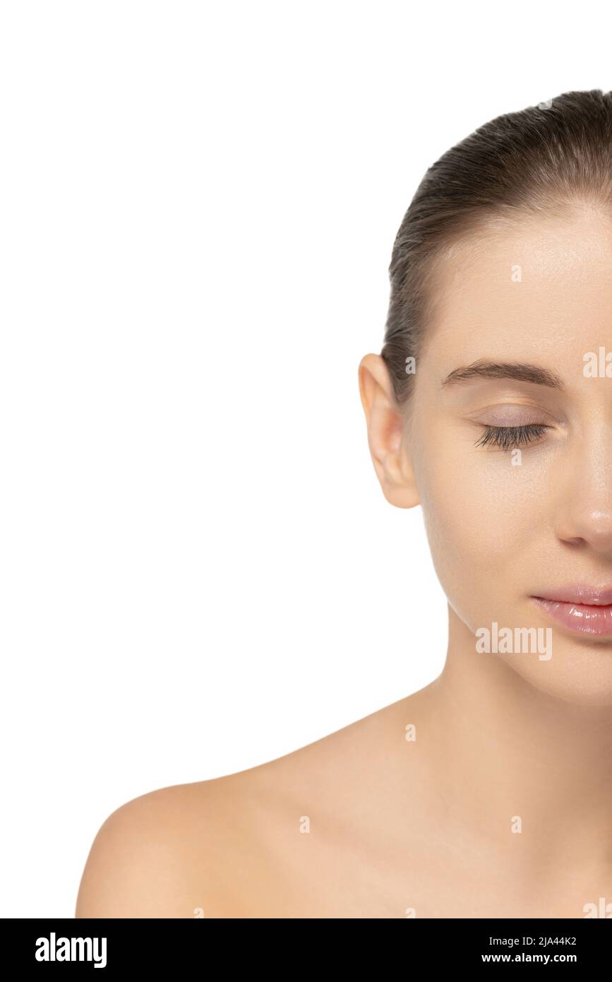 Half-face portrait of young beautiful woman with perfect clean skin and ...