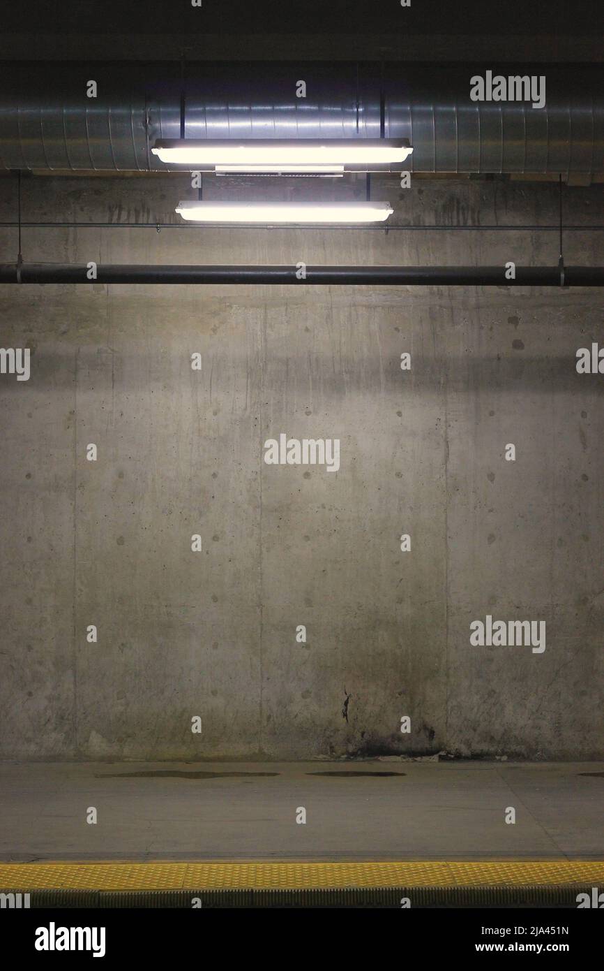 Plain authentic industrial corridor with a bright fluorescent light ...