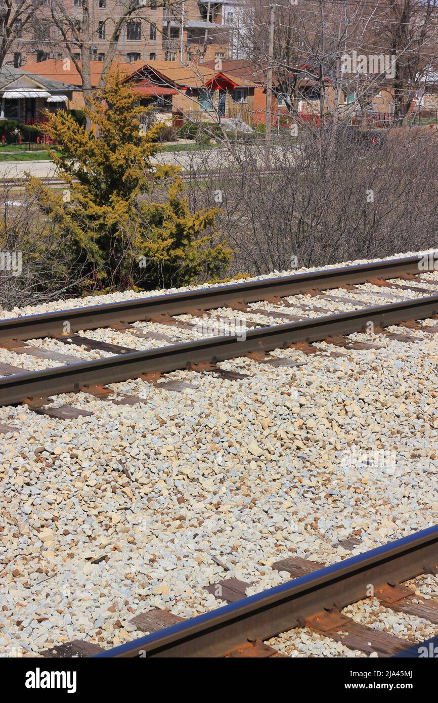 Typical common railroad tracks crossing the plains on a bright sunny ...