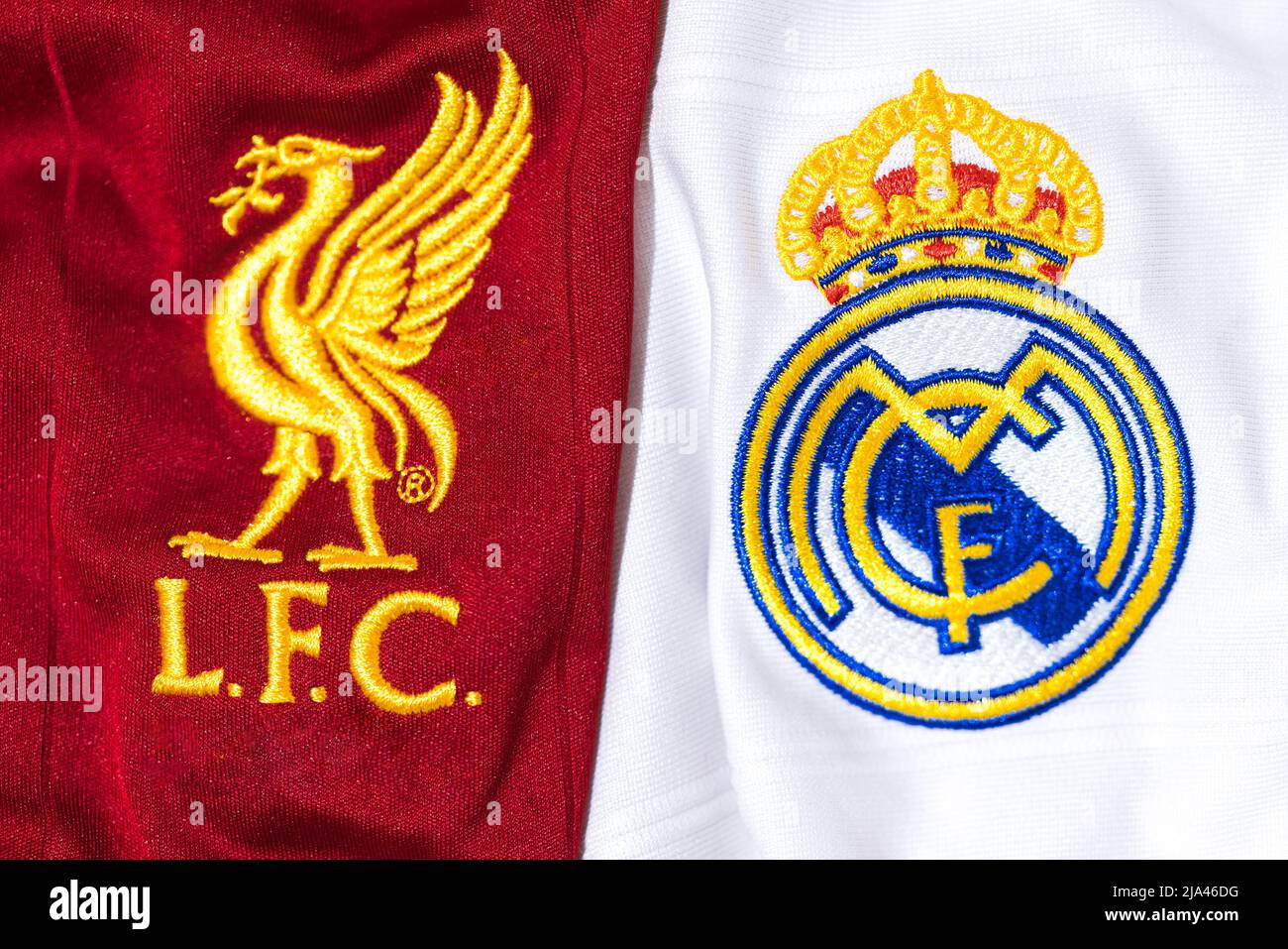 Shield on the Liverpool Football Club shirt next to the Real Madrid ...