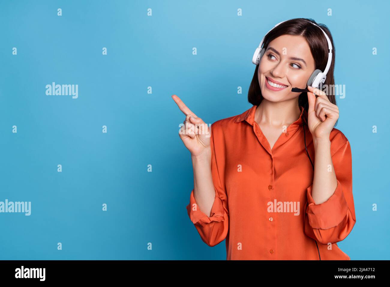 Portrait of attractive trendy cheerful girl help desk service showing ...