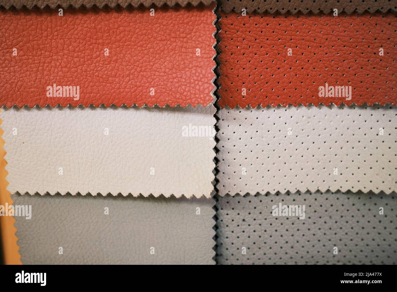 Sample of leather textile brown and red colors, background. Catalog and ...