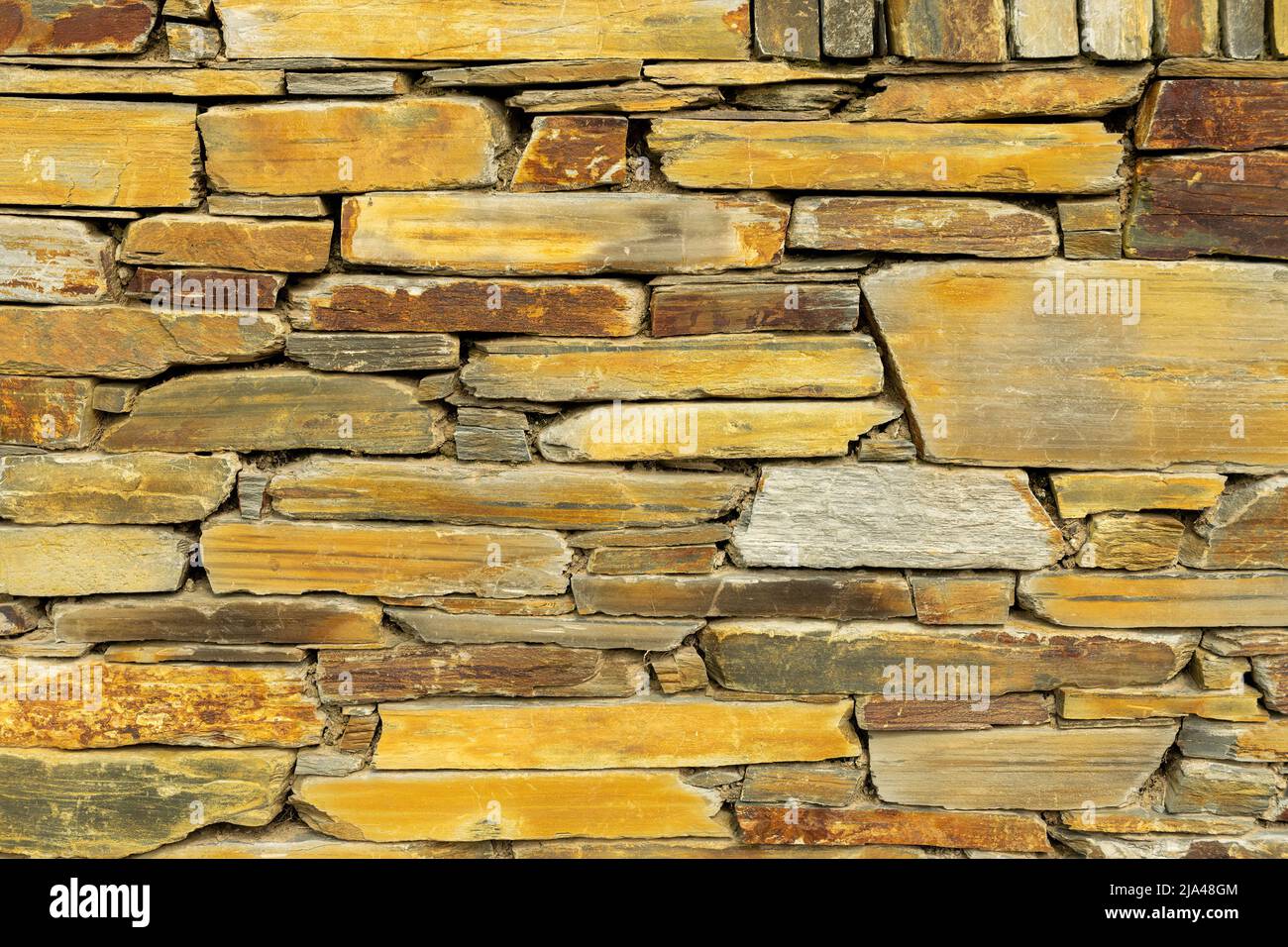 Section of a Sandstone slab built wall Stock Photo - Alamy