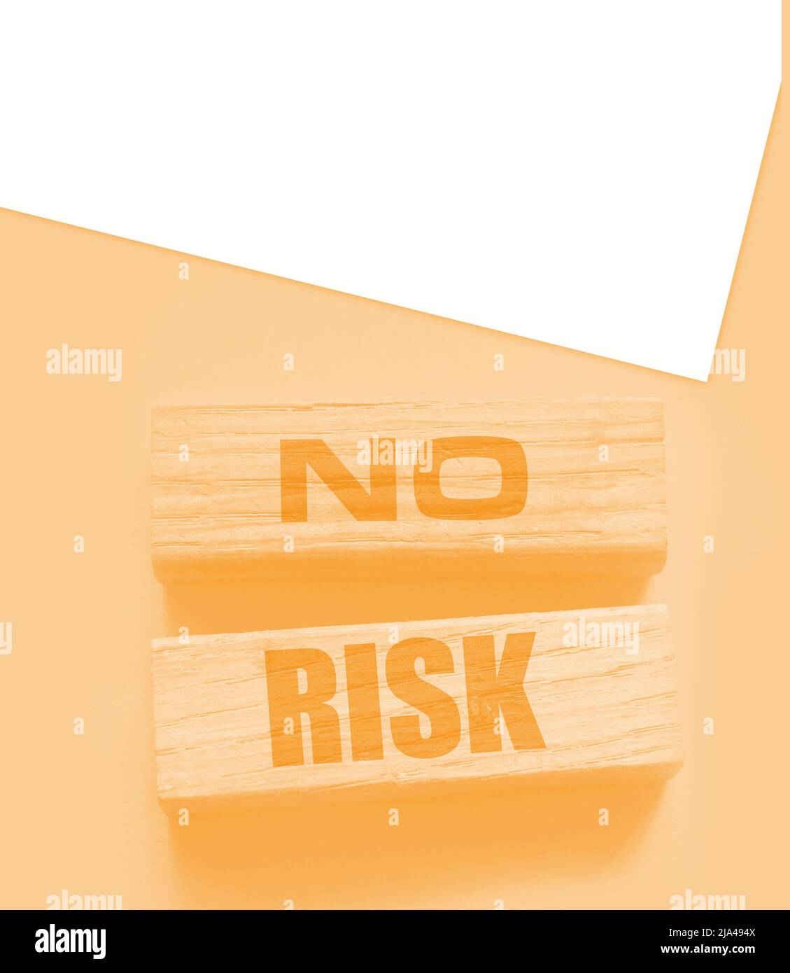 No Risk words on wooden blocks on yellow background. Risk management ...