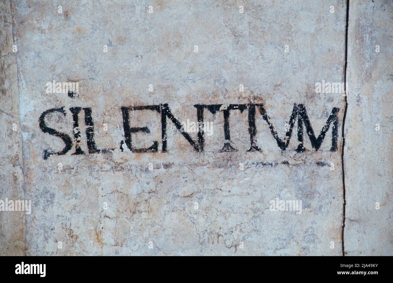 Inscription "Silentium" in the ancient refectory of the monastery of ...