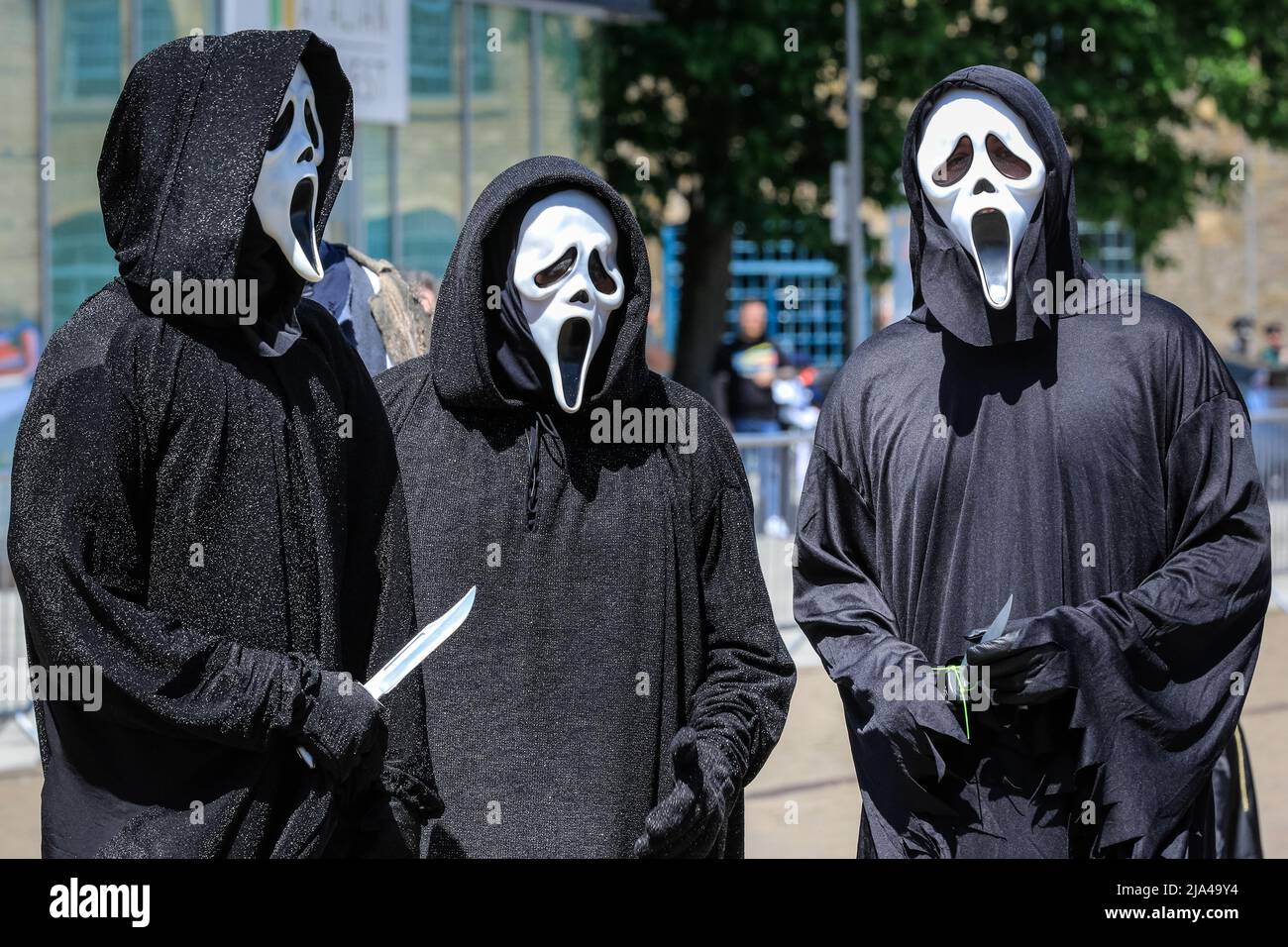 London, UK. 27th May, 2022. A "Scream" group hover over a mobile phone ...