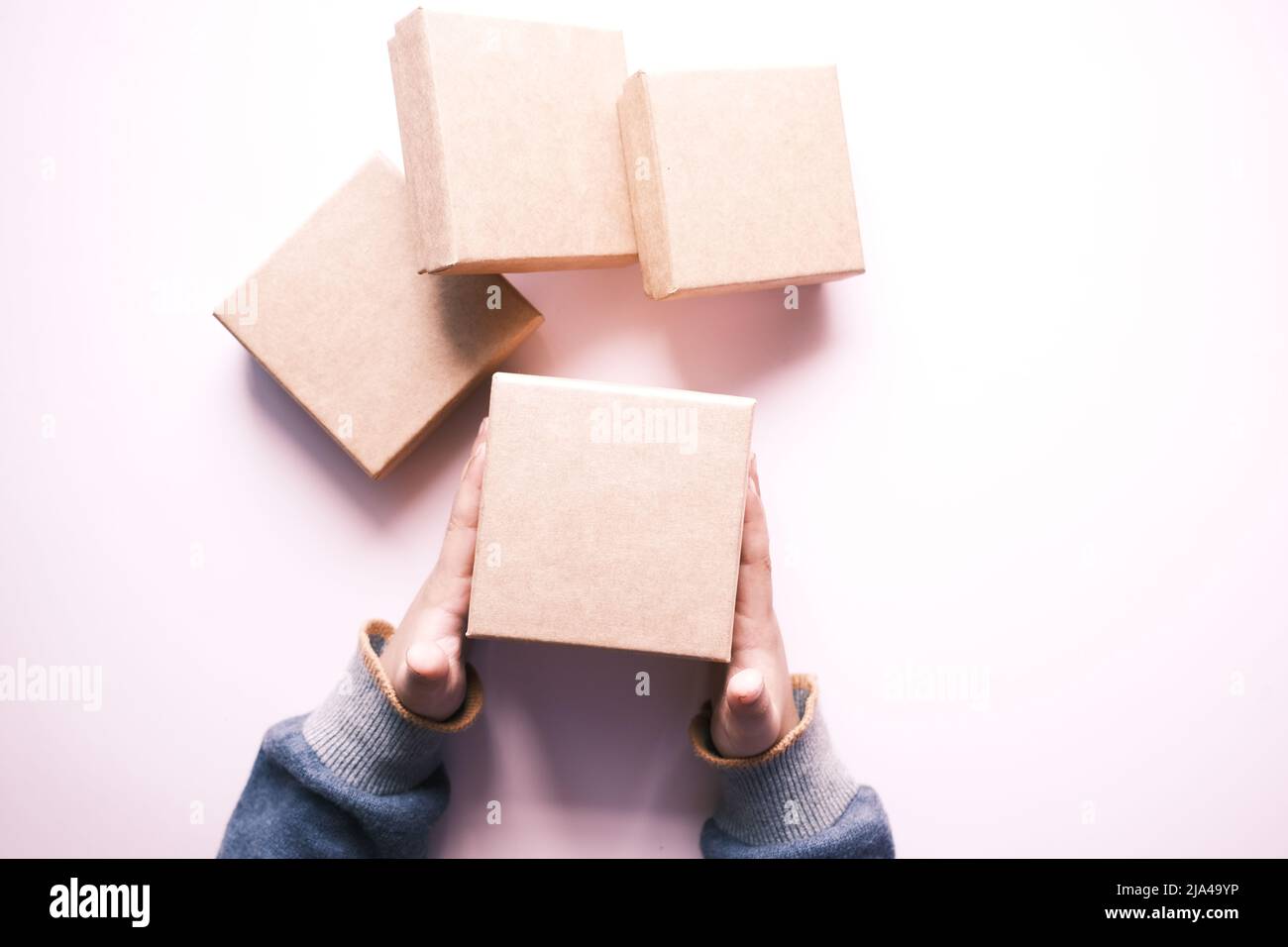 Hand hold homemade gift box hi-res stock photography and images - Alamy