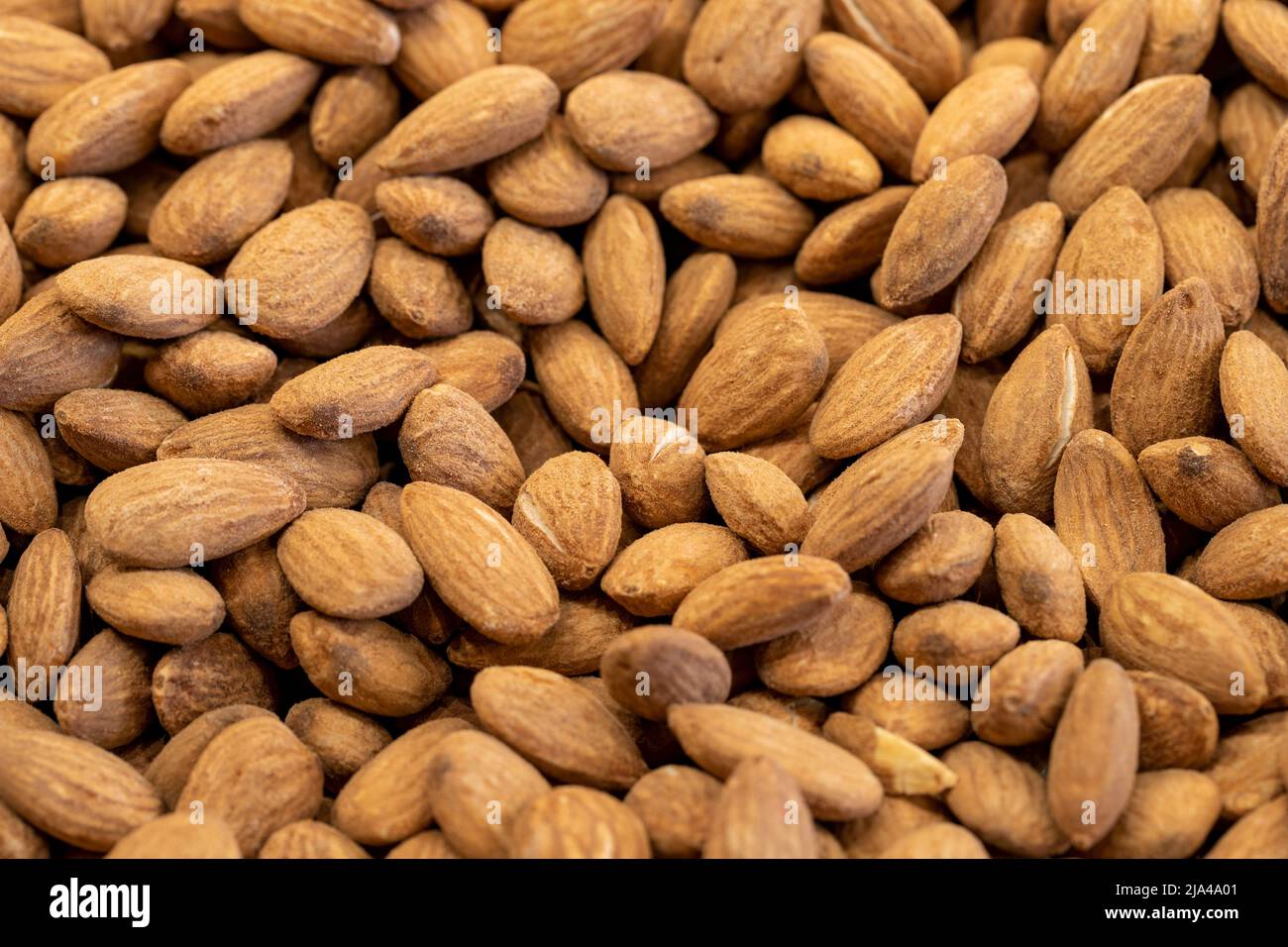 Roasted Almond Nuts. Organic healthy food. Close-up Stock Photo - Alamy