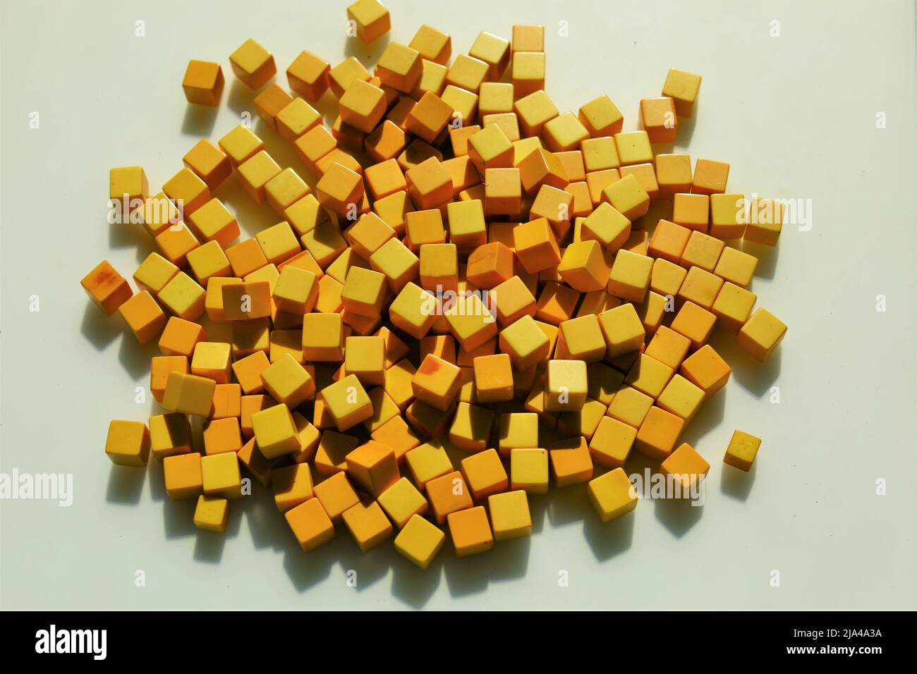 Yellow egg yolk color unfinished dice cubes from bakelite factory in ...