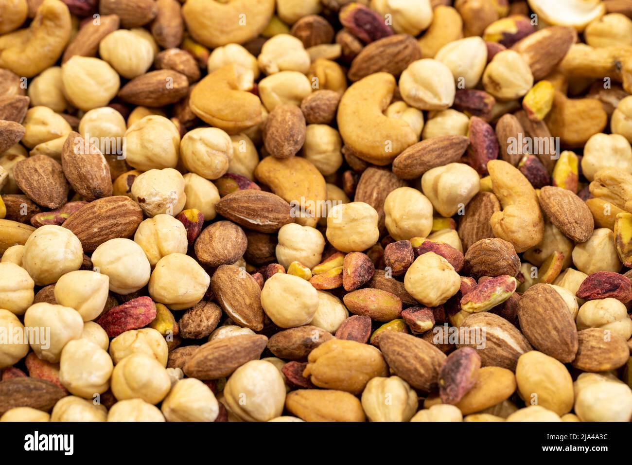 Group of mixed nuts hi-res stock photography and images - Alamy