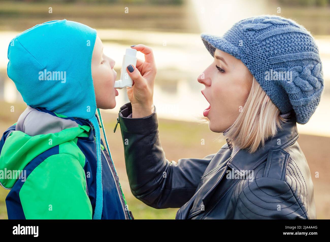 A child using an inhaler for the treatment of asthma hi-res stock ...