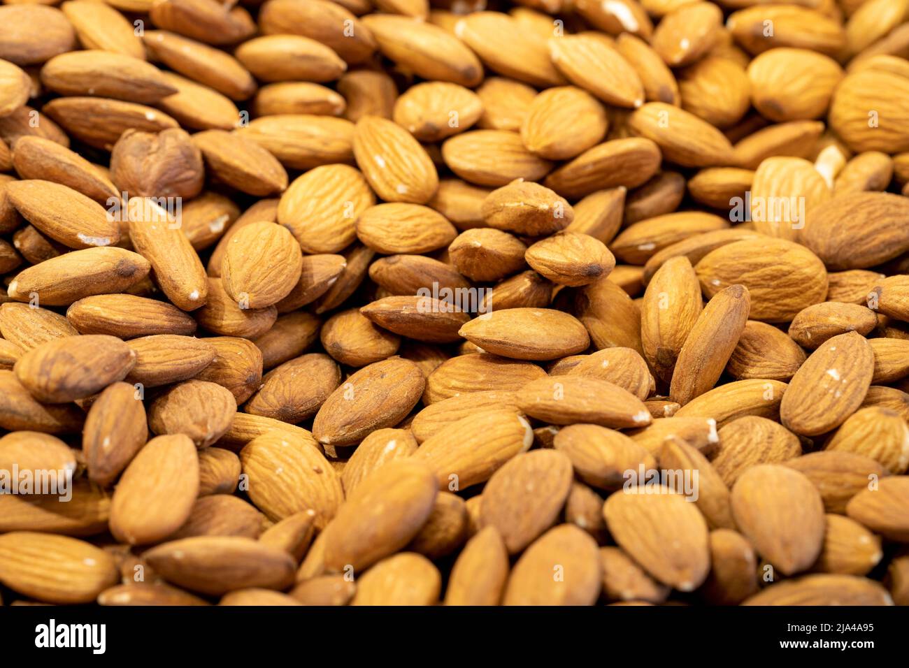 Roasted Almond Nuts. Organic healthy food. Close-up Stock Photo - Alamy