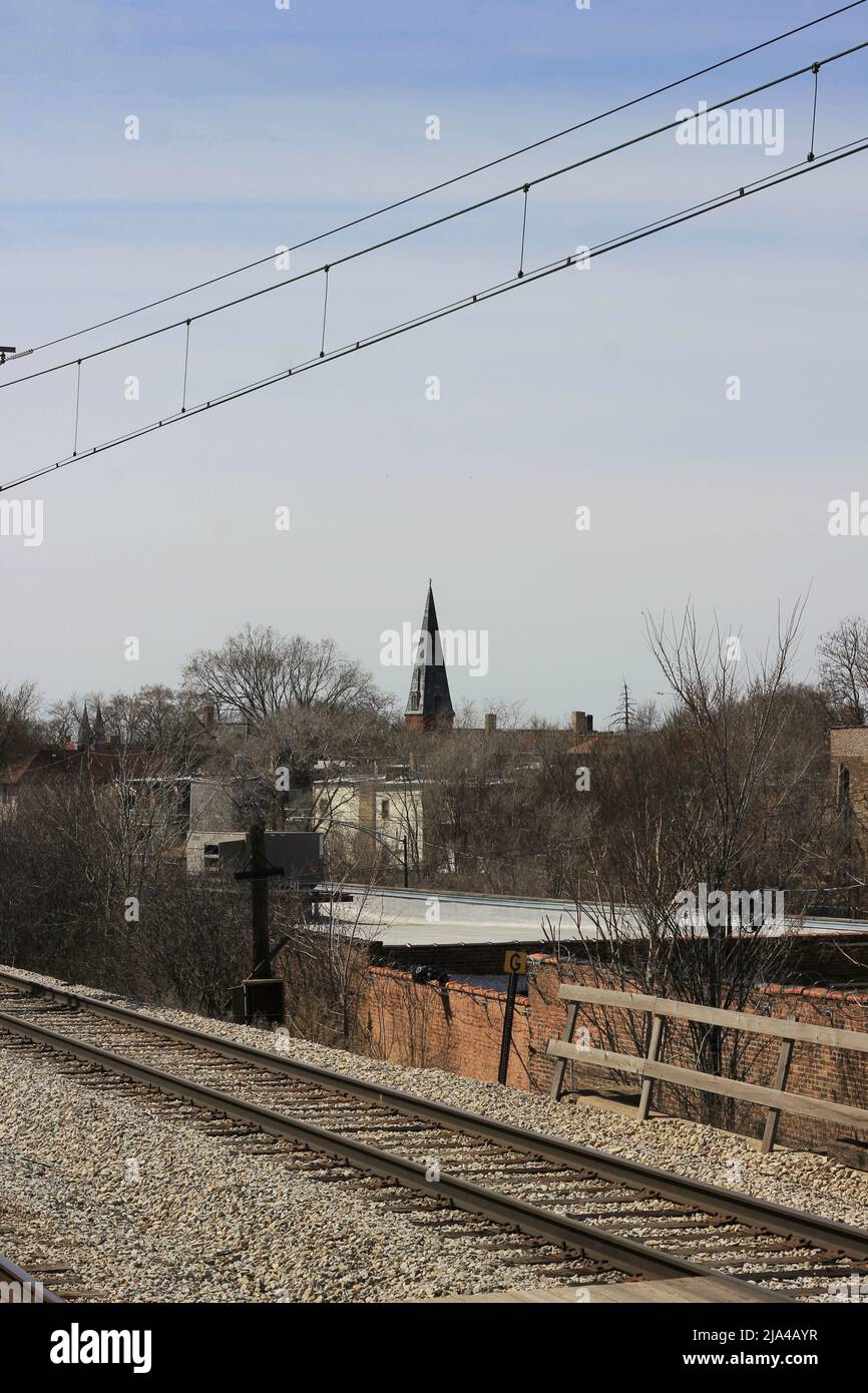 Typical common railroad tracks crossing the plains on a bright sunny ...