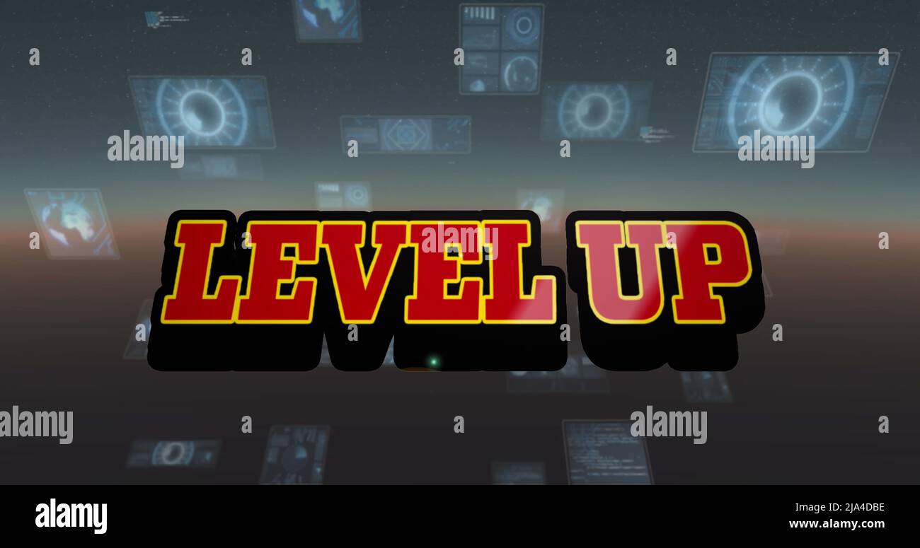 Image of level up text in red letters over screens with data processing ...