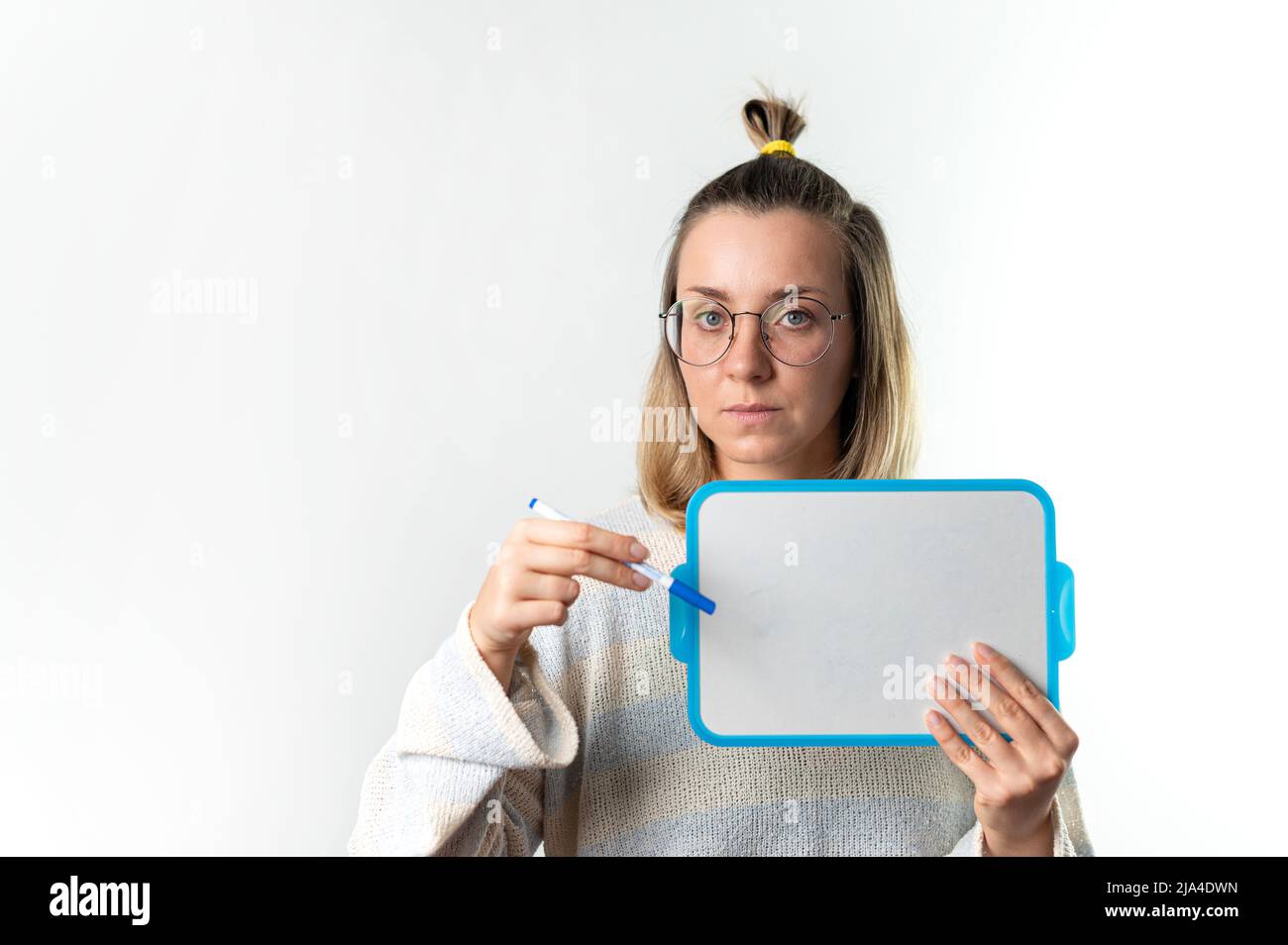 Young female holding notes, young professional or student Stock Photo ...