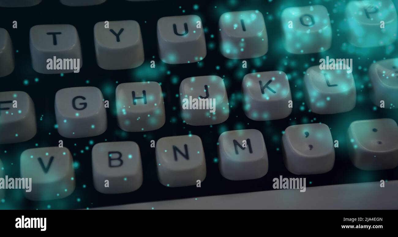 Image of white spots over keyboard Stock Photo - Alamy