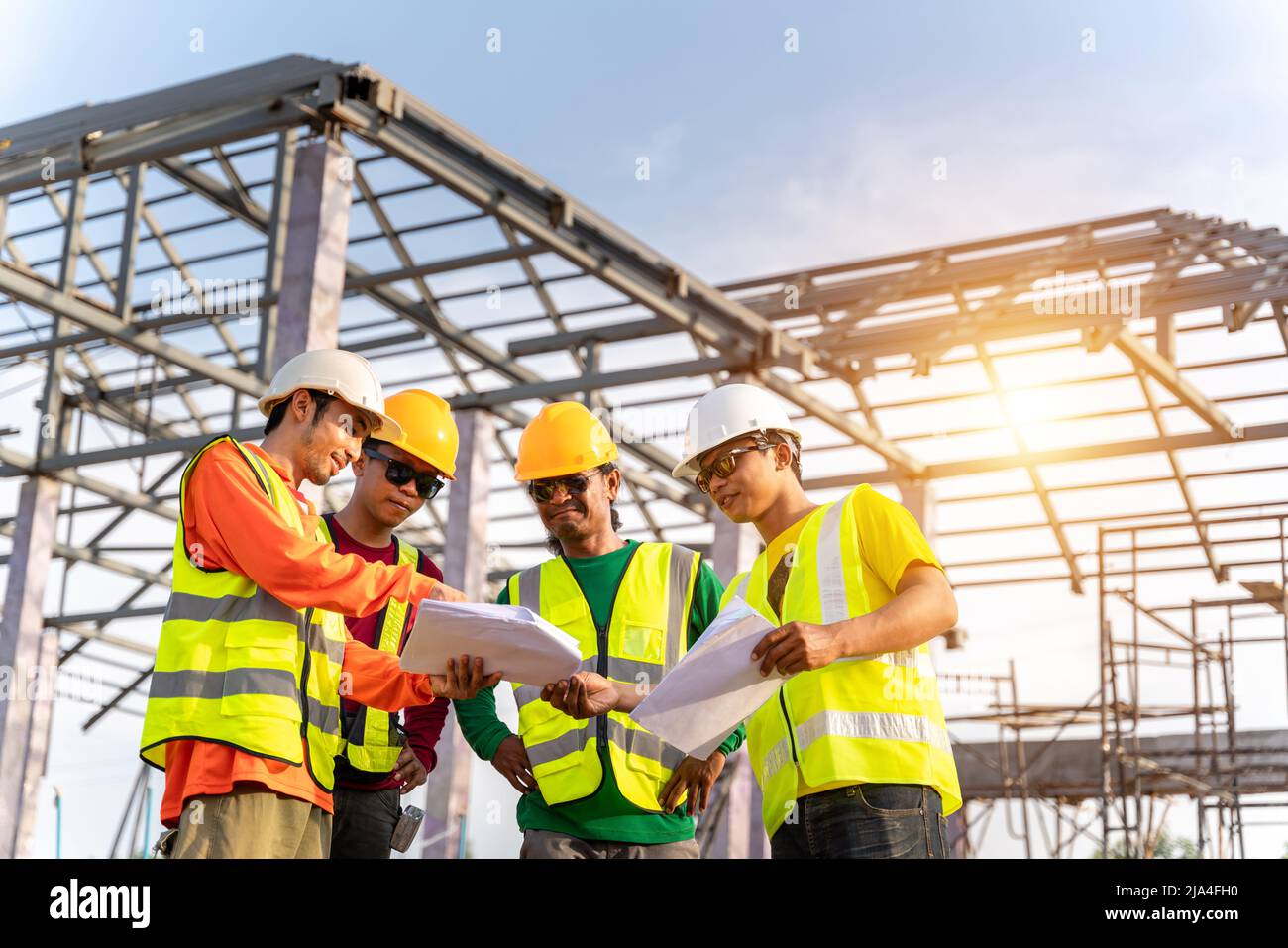 4 Workers in Construction Site, Engineer technician and Architect ...