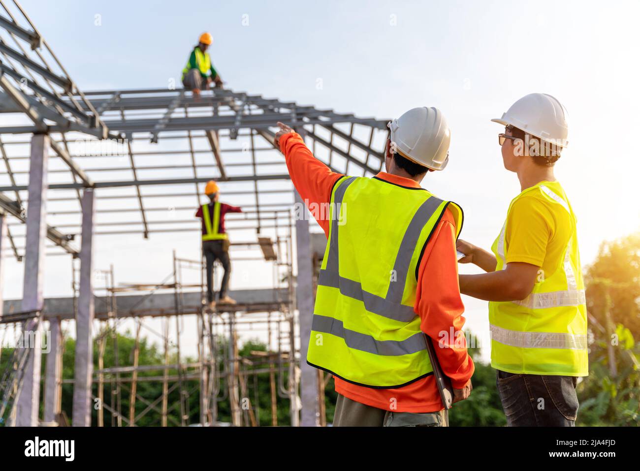 4 Workers in Construction Site, Industrial Building Construction Site ...