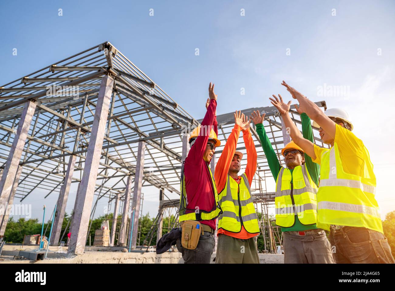 Successful fo Architect and Engineer construction workers join hands ...