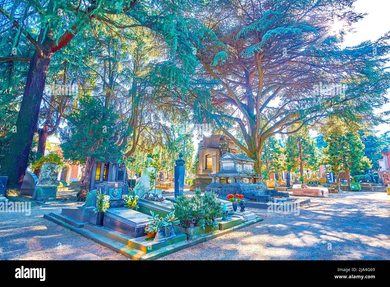 Historical graves and mausoleums of local noble families in a shade of ...