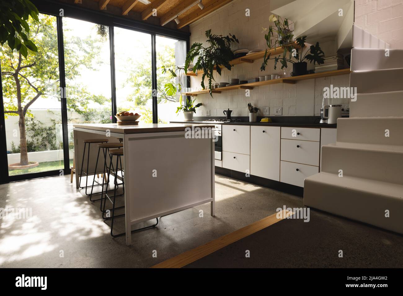 View of modern interior of kitchen of a modern house Stock Photo - Alamy