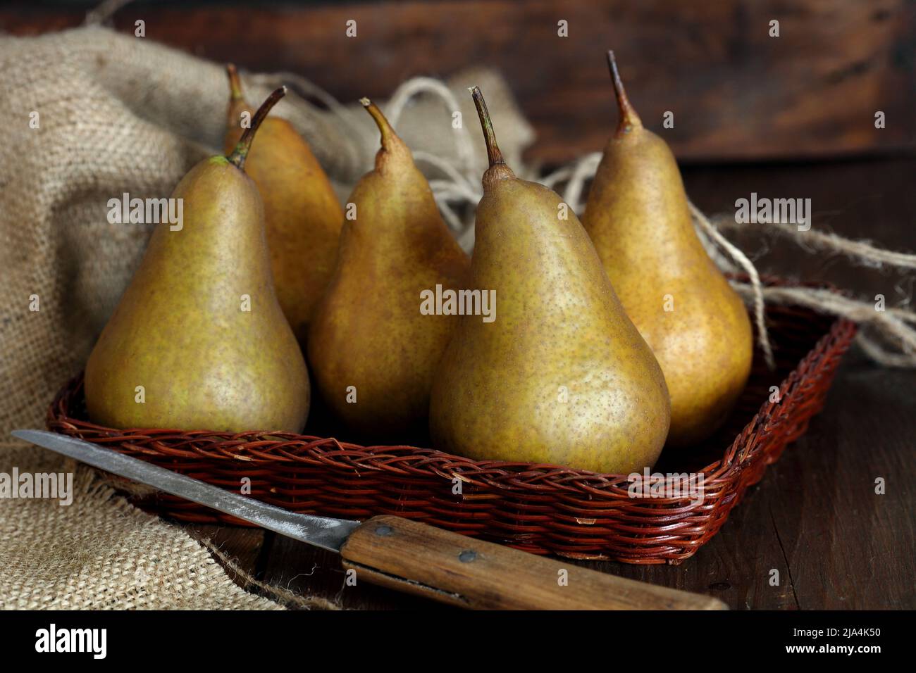 group of ripe pears lie on old planed wooden boards Stock Photo - Alamy