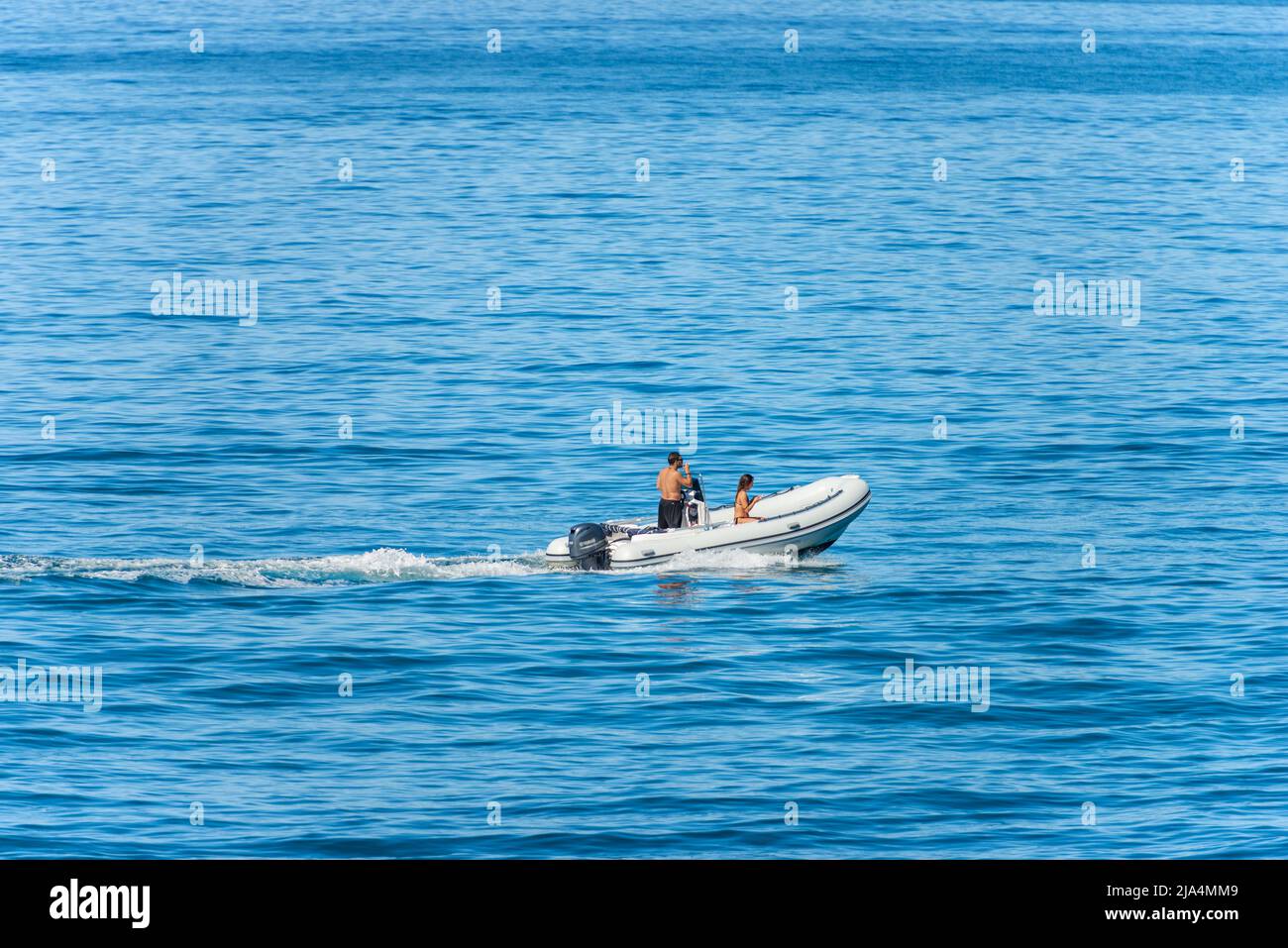 Two people in a dinghy hi-res stock photography and images - Alamy
