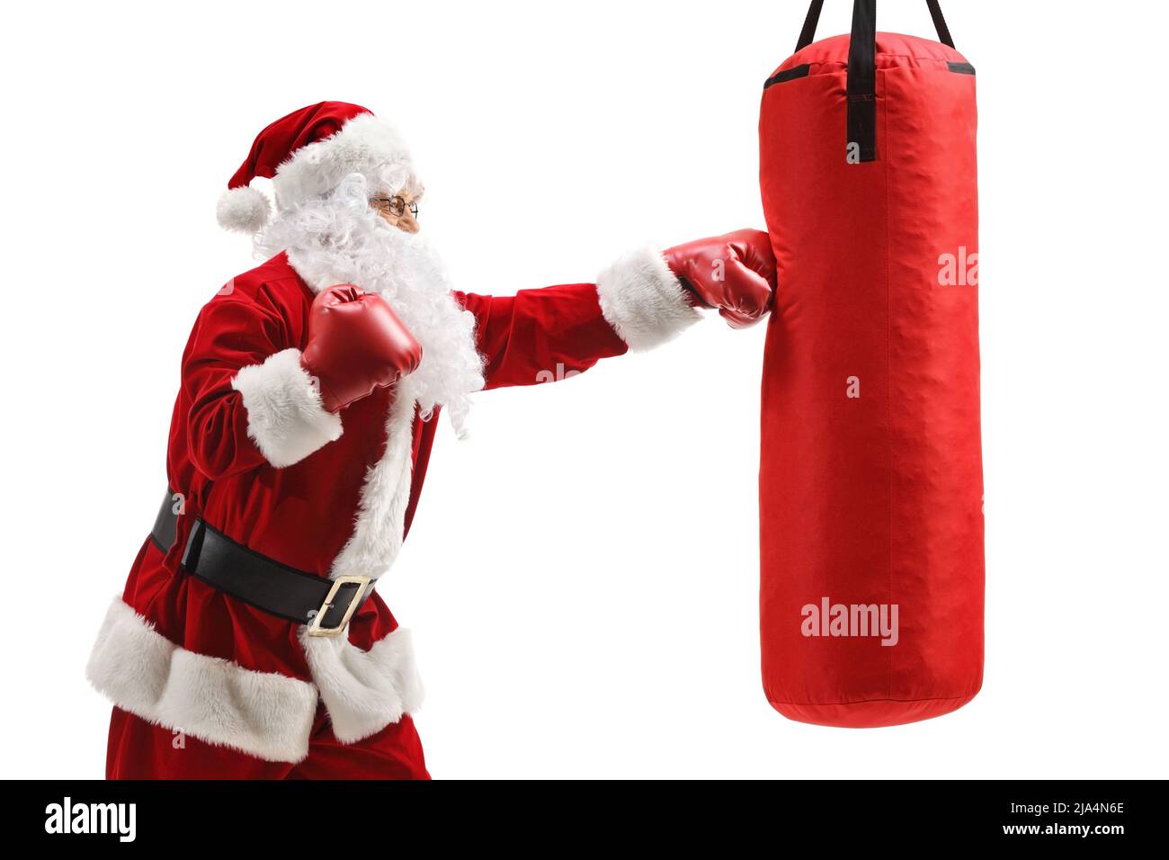 Santa claus boxing a punching bag isolated on white background Stock ...
