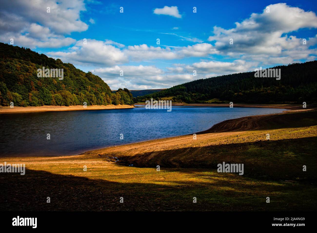 dry mud planes at the base of Ladybower Reservoir after a dry summer ...