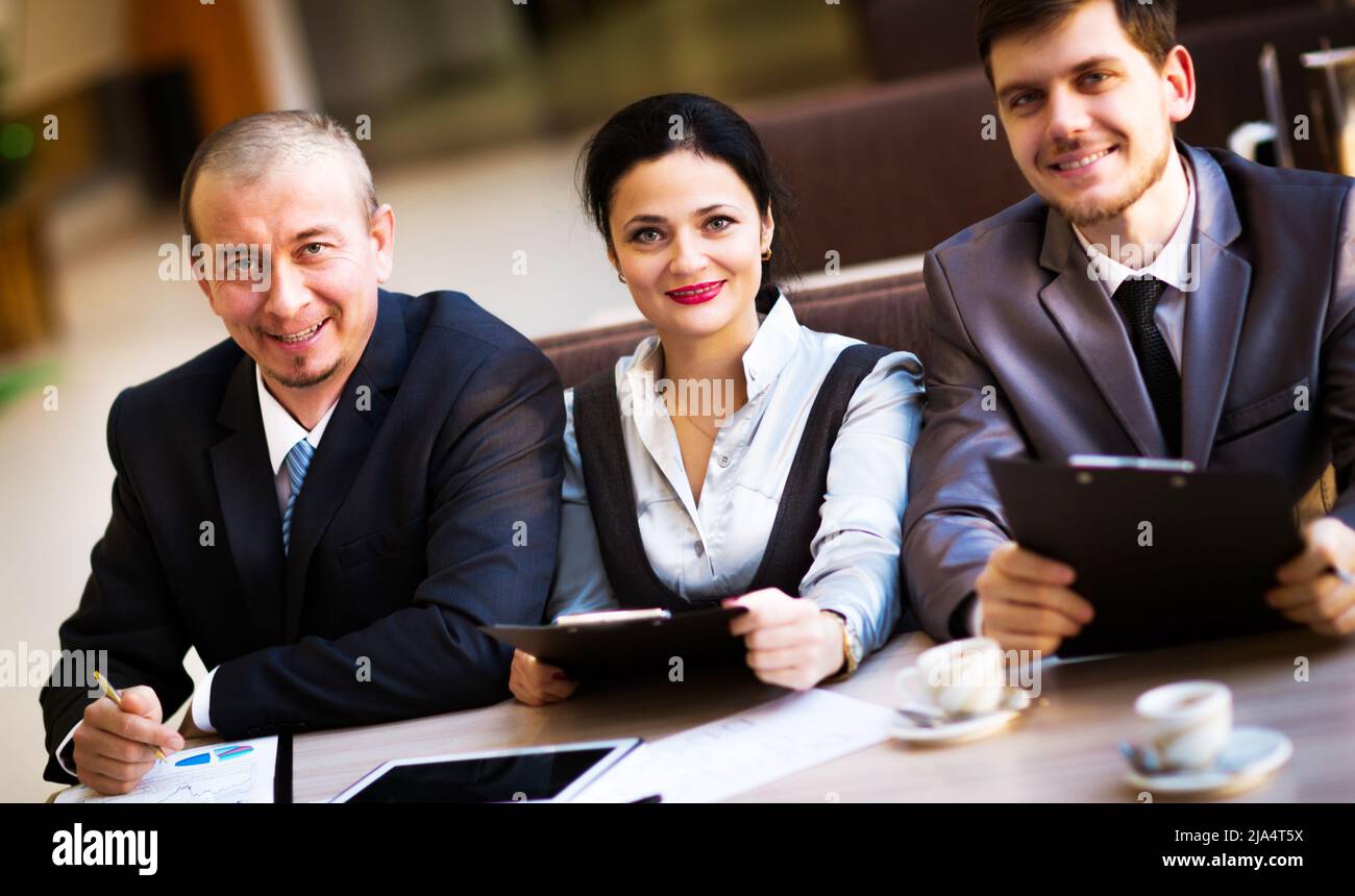 Business team working together to achieve better results Stock Photo ...