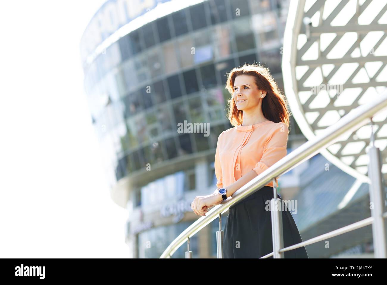 Young, attractive, successful business woman, confidently looking ...