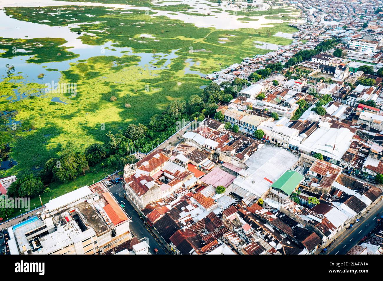 Aerial view of Iquitos, Peru with the Itaya River in the background in ...