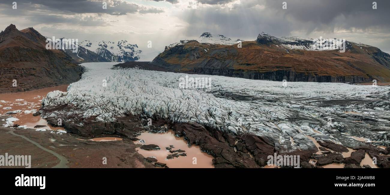 Beautiful glaciers flow through the mountains in Iceland Stock Photo ...