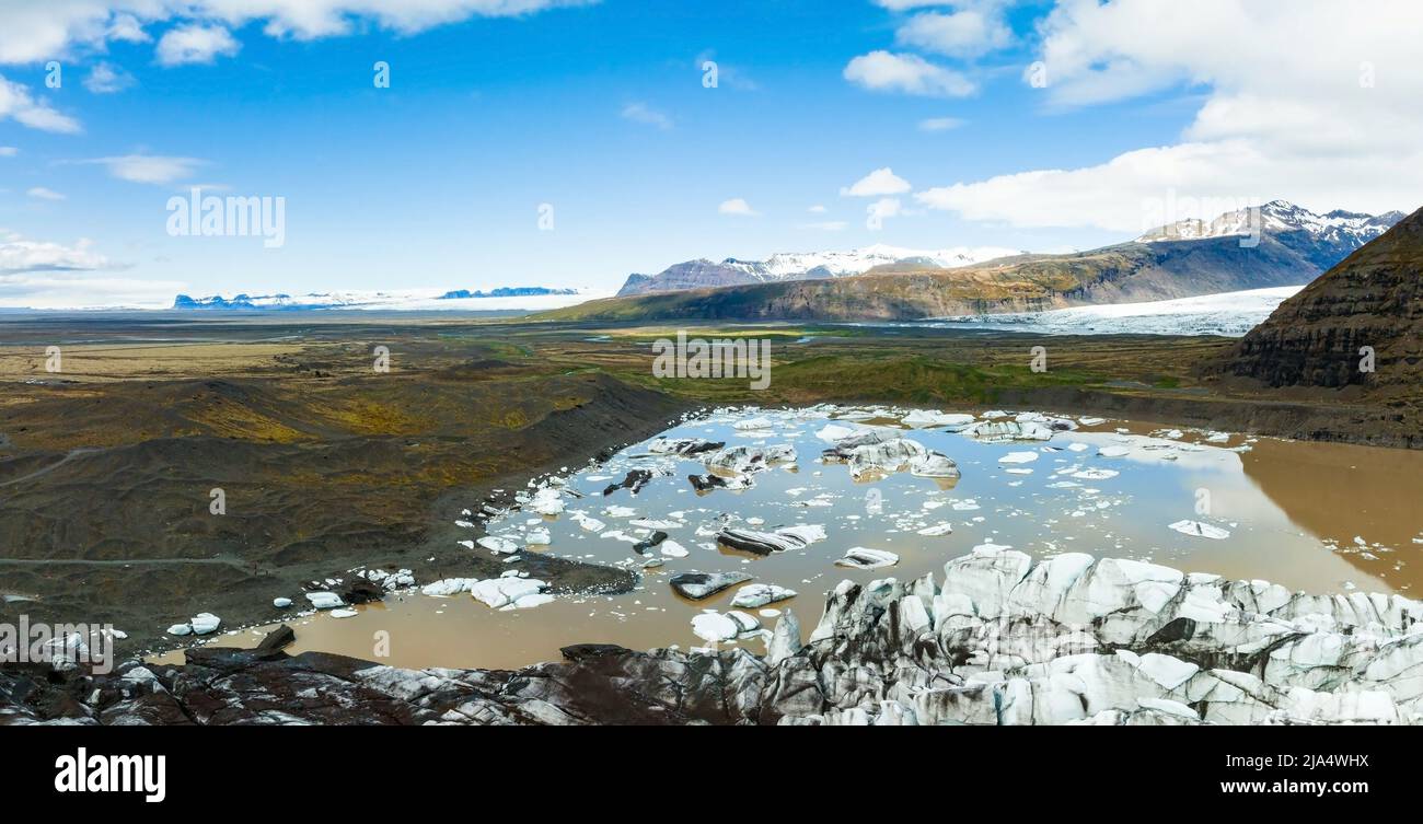 Beautiful glaciers flow through the mountains in Iceland Stock Photo ...