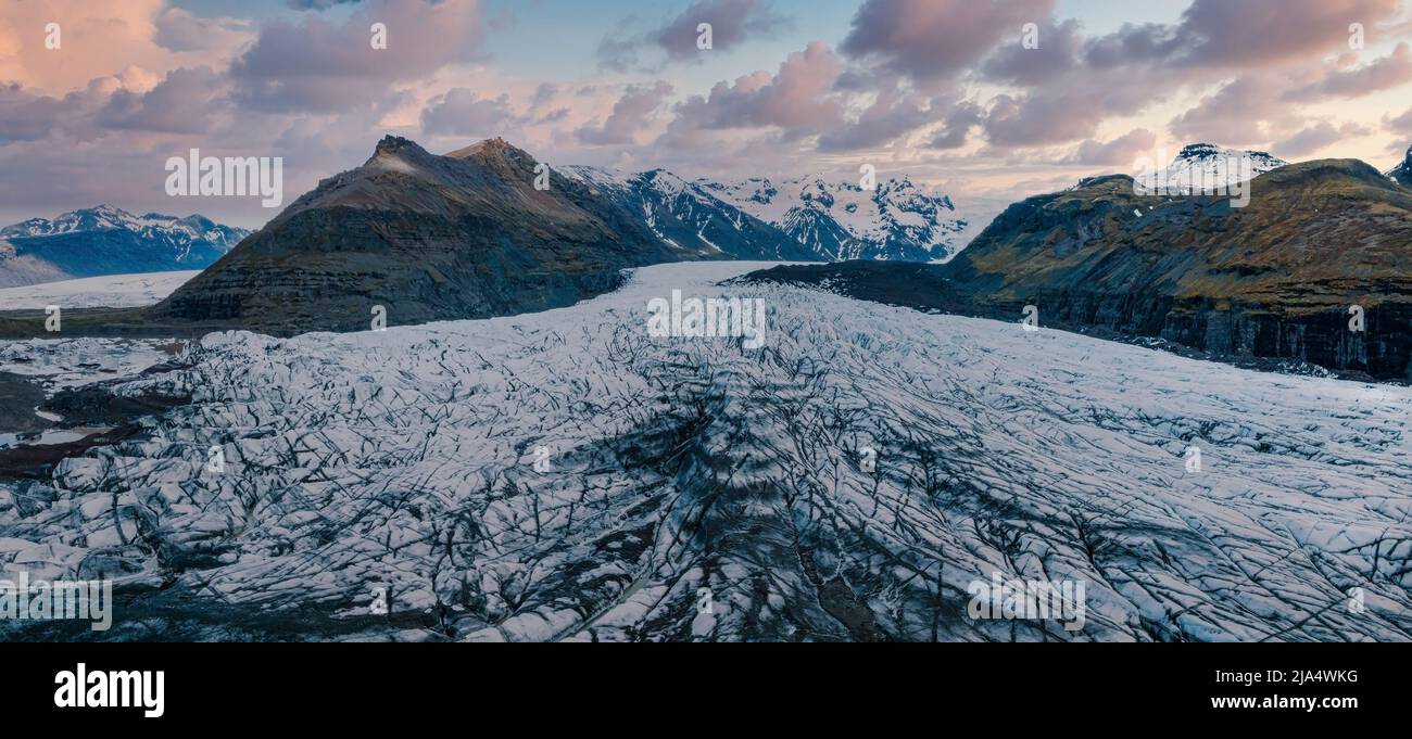 Beautiful glaciers flow through the mountains in Iceland Stock Photo ...