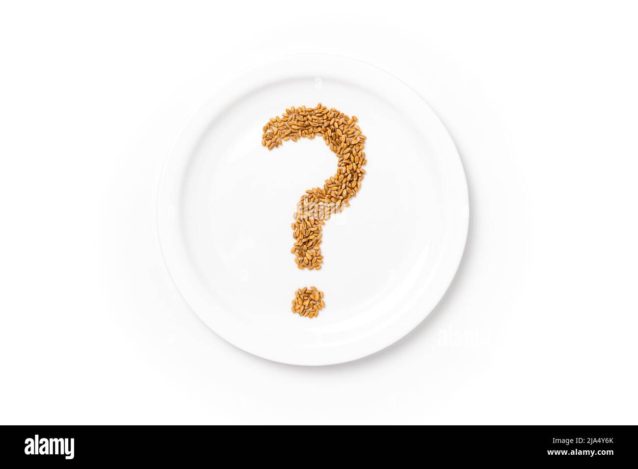 Question mark made of wheat grains on white plate. Concept of global ...