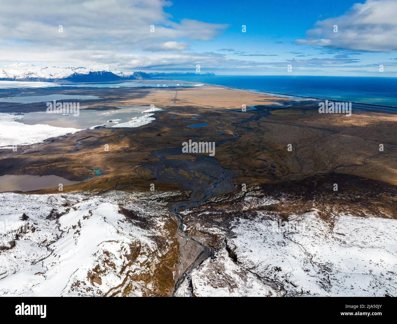 Aerial view of the glaciers and snowy mountains in Iceland Stock Photo ...