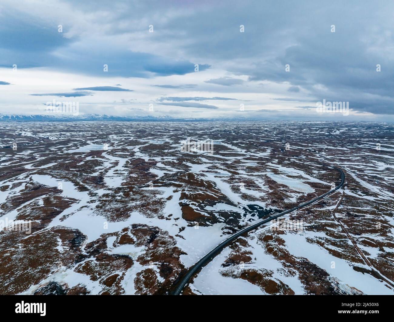 Aerial video of an empty lava fields and huge volcanic mountain in ...