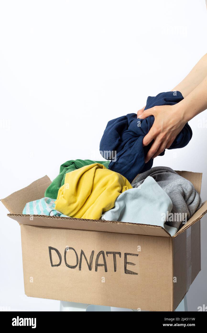Donation clothes box on a white background. Charity concept. Waste ...