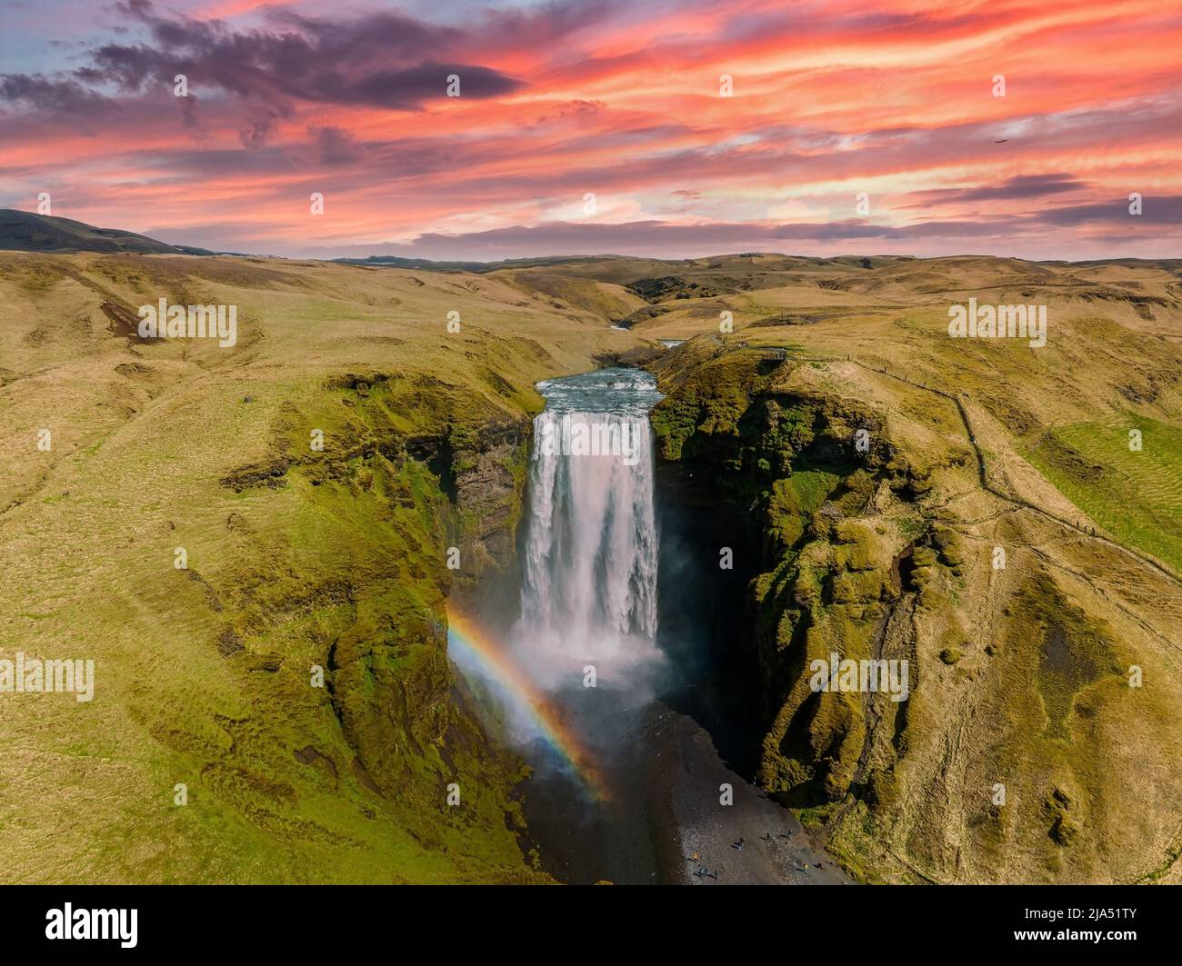 Famous Skogafoss waterfall with a rainbow. Dramatic Scenery of Iceland ...